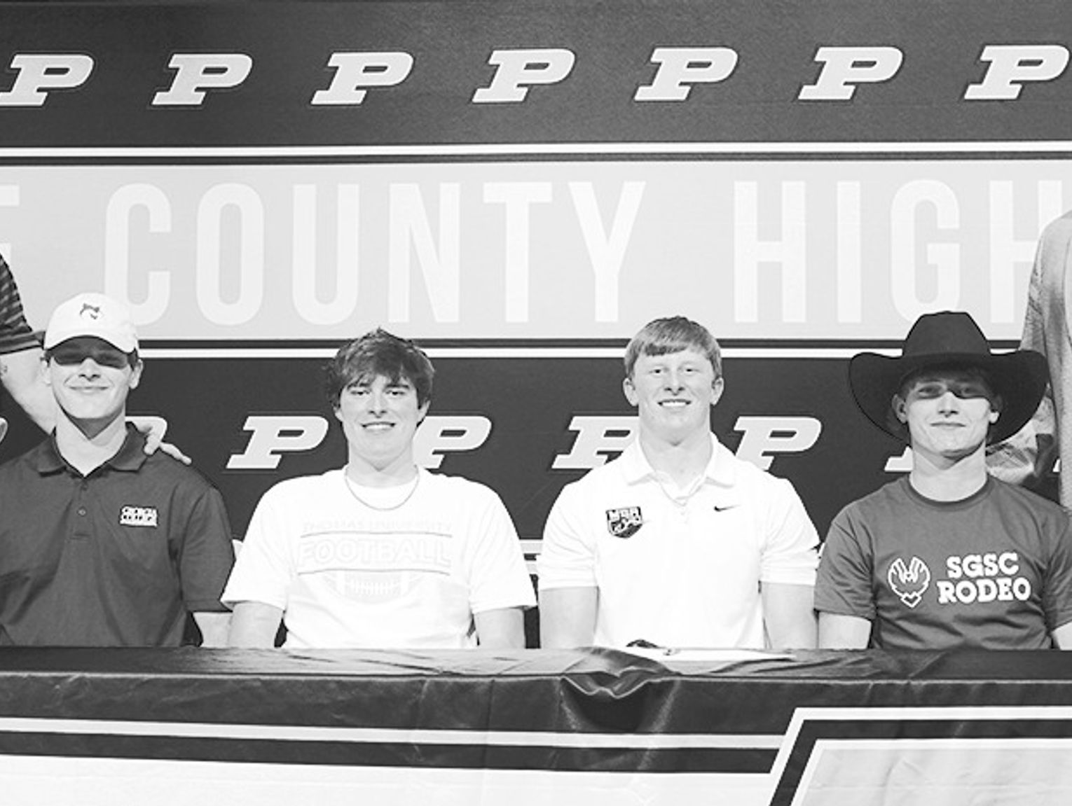 Dowling, McCook, Hall, Stone sign scholarship offers